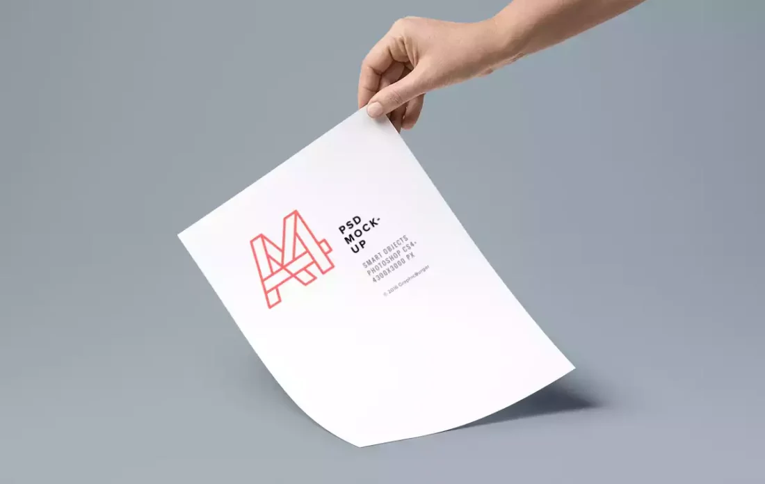 Hand Holding A4 Flyer Mockup | Design Shack