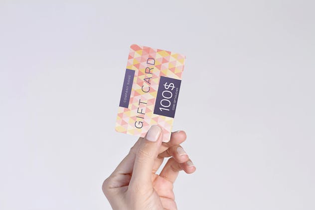 Hand Holding Gift Card Mockup | Design Shack