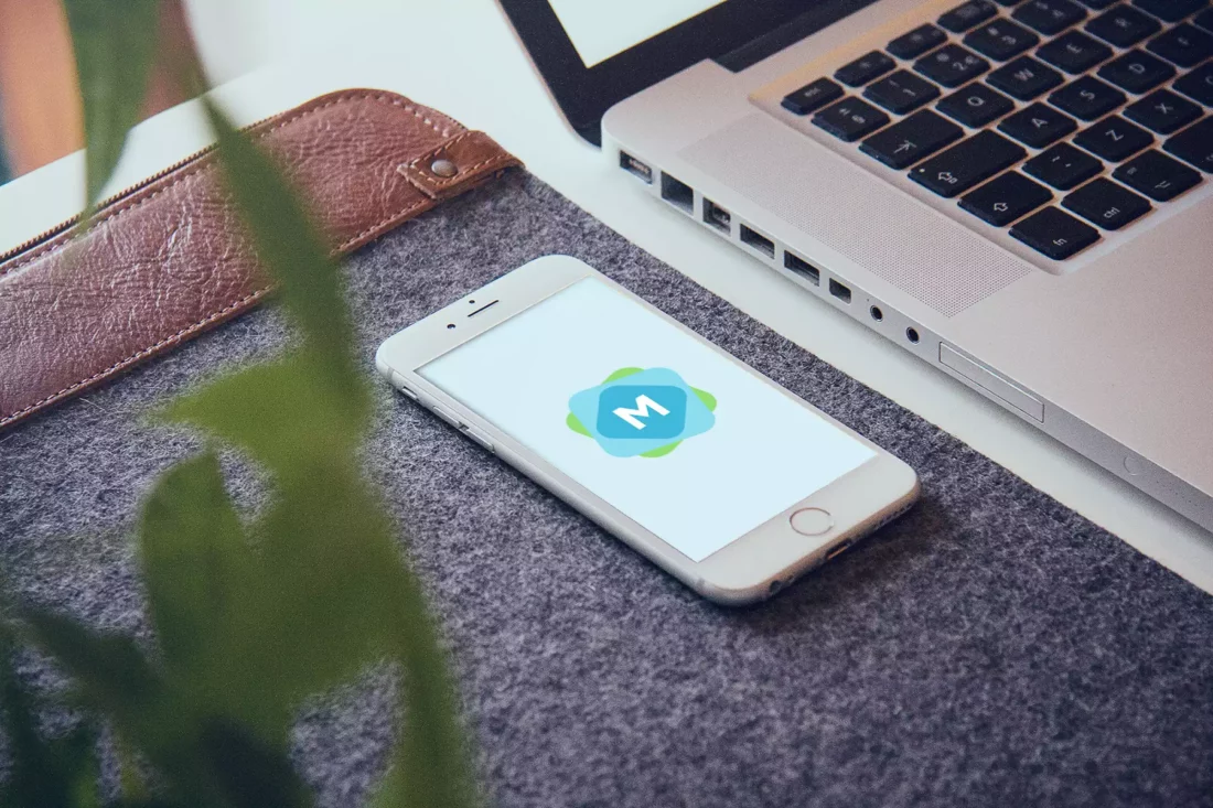 White iPhone & Table PSD Mockup | Design Shack